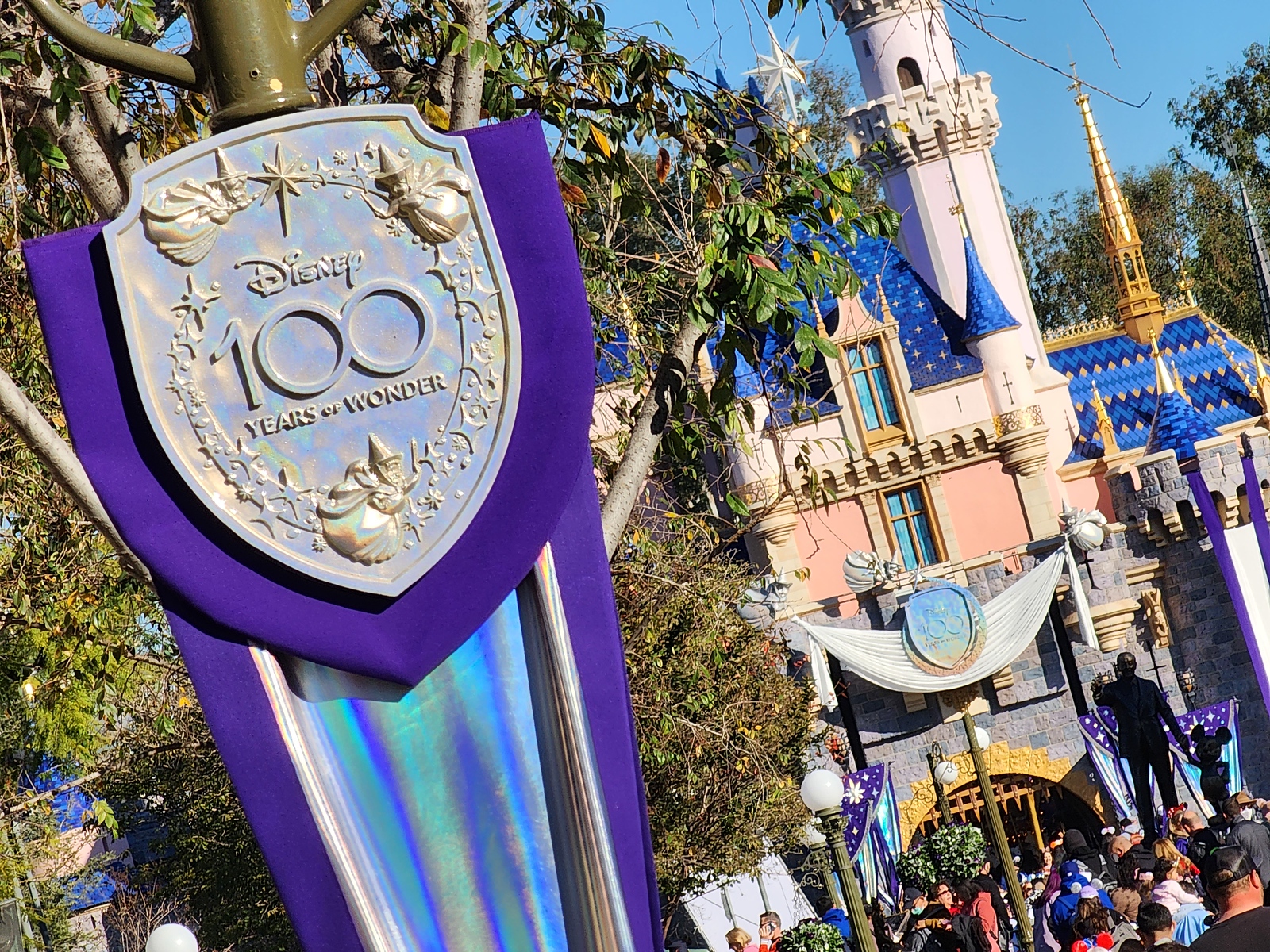 Purple and platinum inspired décor adorns the Disneyland Resort for 100 ...