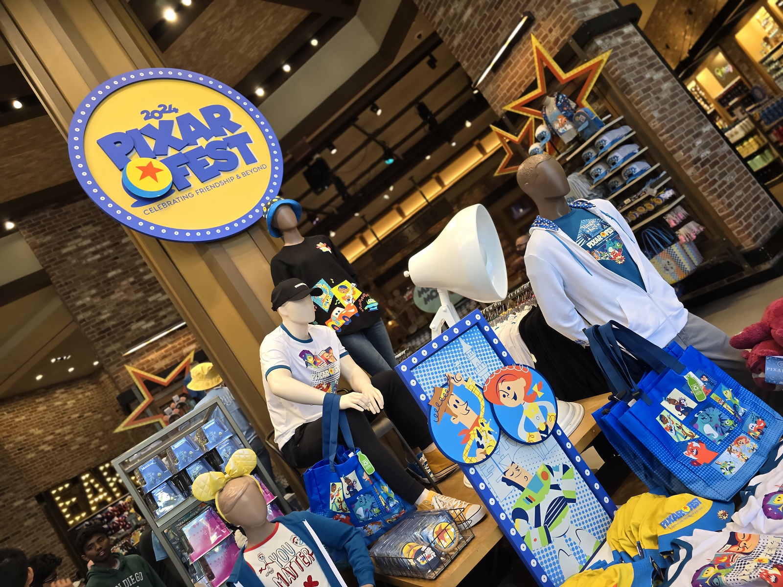 MERCH RUN: 2024 Pixar Fest brings a cascade of colorful commemorative ...